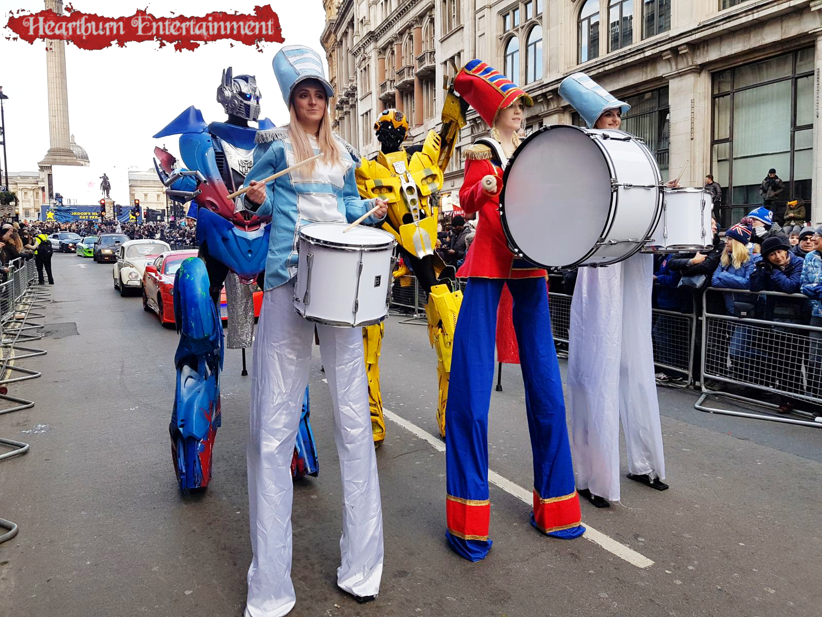 Hire drumming stilt walkers | Hire musical stilt walkers | Drummers on ...